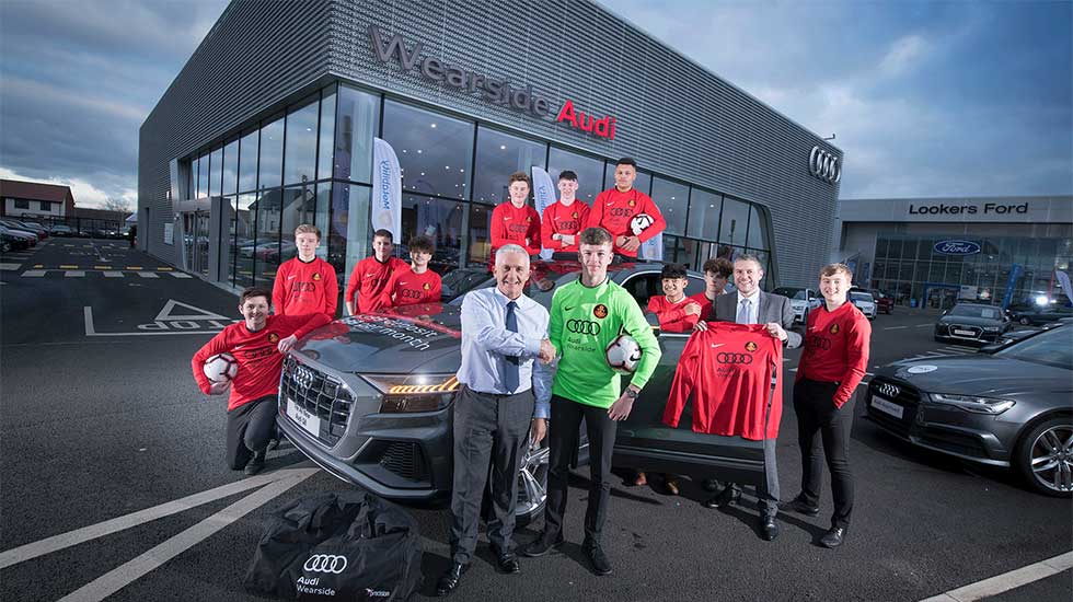 Dealership supports young footballers with new kits and additional support